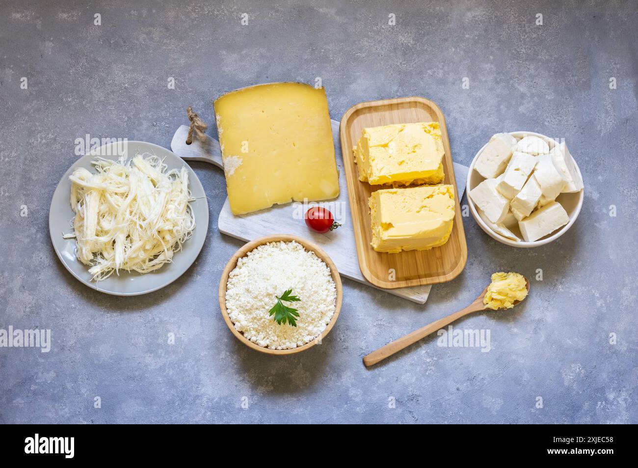 Delicatessen concept, different kinds of cheese and butter, cheddar ...