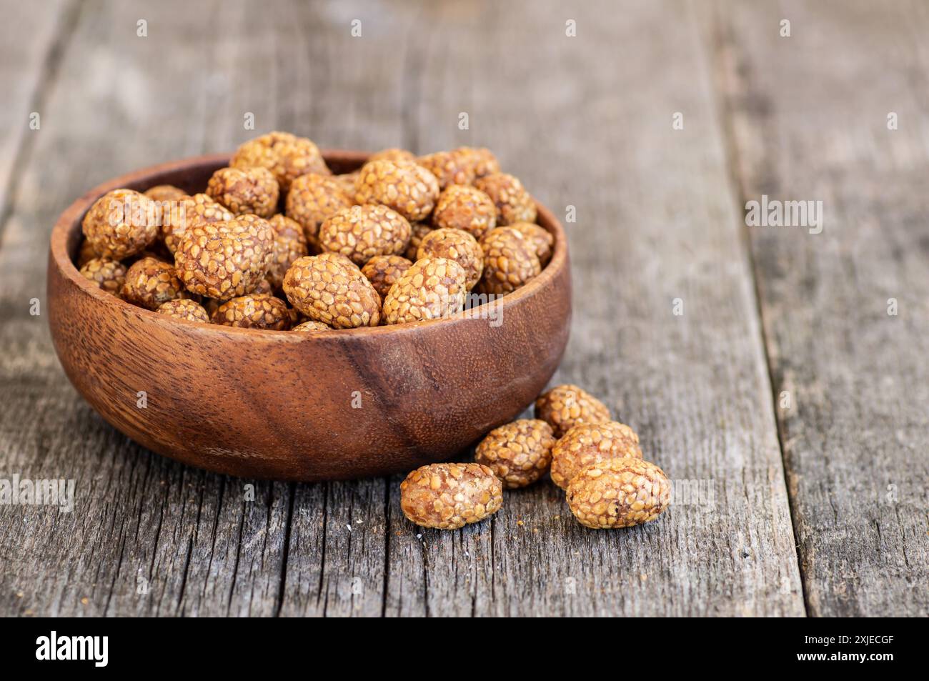 Sesame coated peanuts with honey and molasses, traditional turkish nut ...