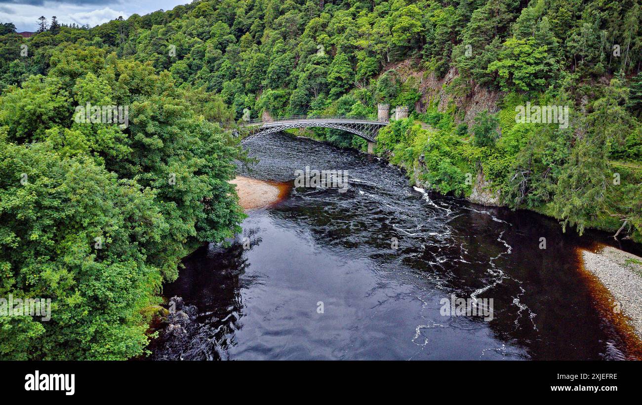Craigellachie Bridge cast iron arch bridge over the River Spey trees in ...
