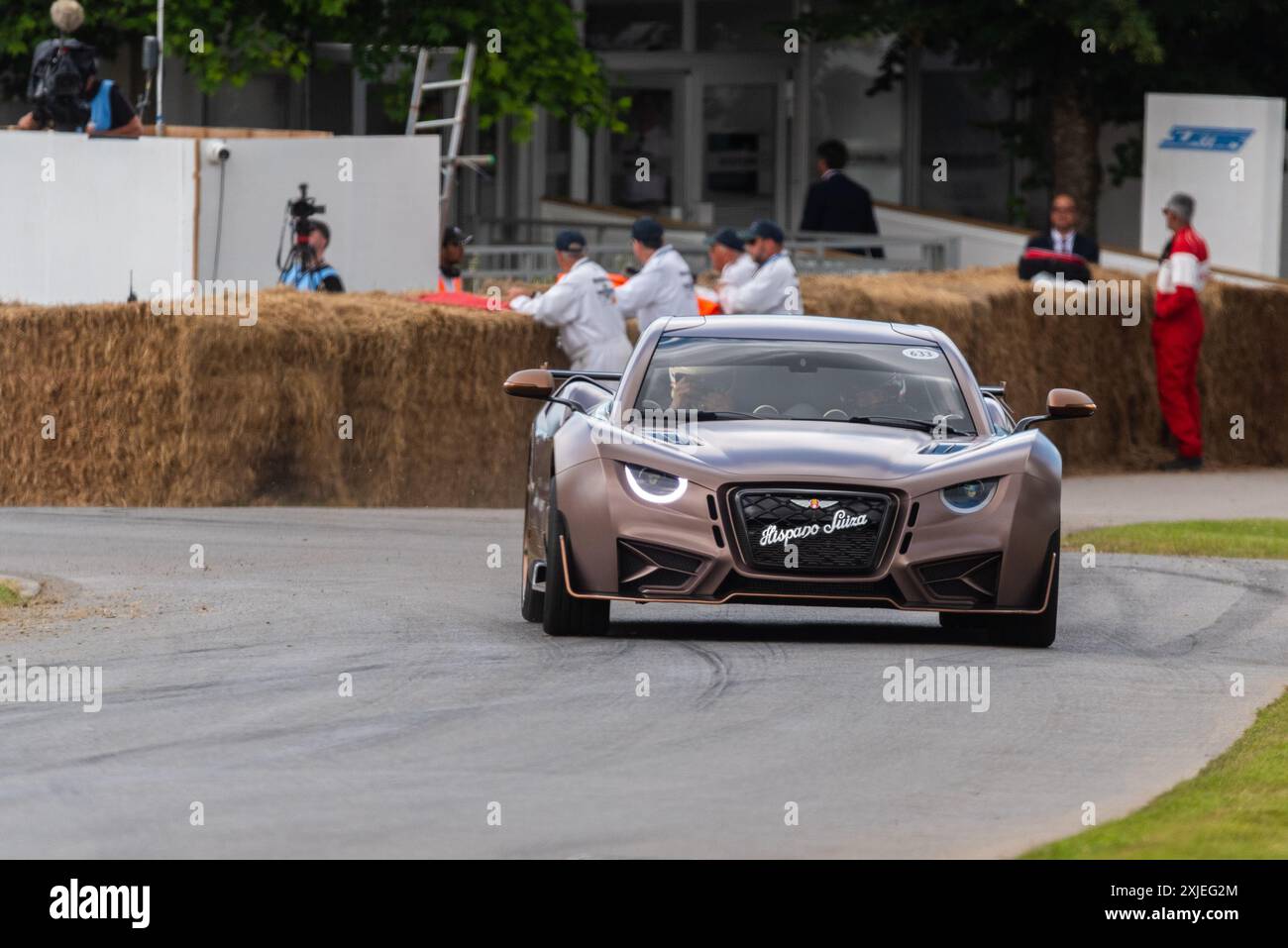 2024 Hispano Suiza Carmen Sagrera electric sports car driving up the hill climb track at the ...