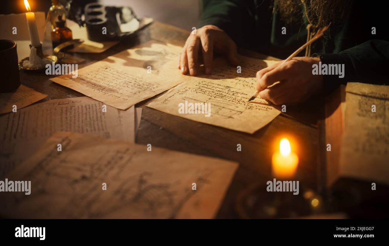 Medieval scholar scroll hi-res stock photography and images - Alamy