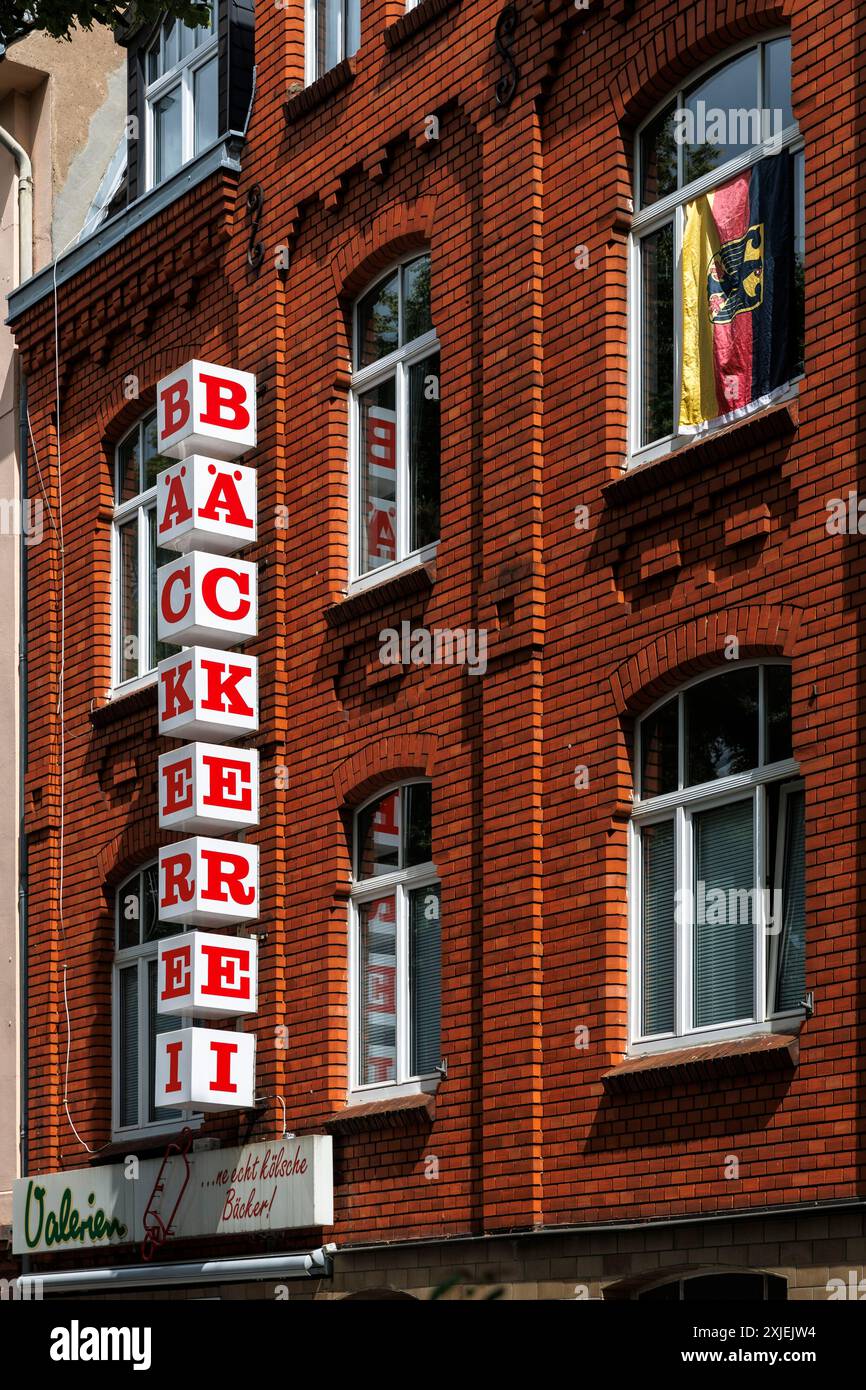 sign of a bakery on Alpenerplatz in the Ehrenfeld district, German flag ...