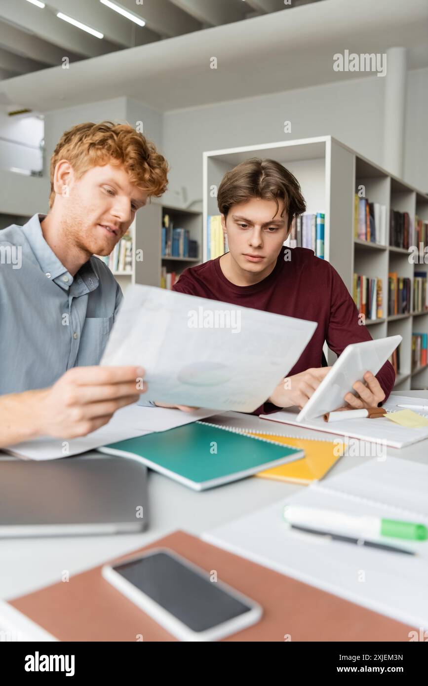 Two young college students review hi-res stock photography and images ...