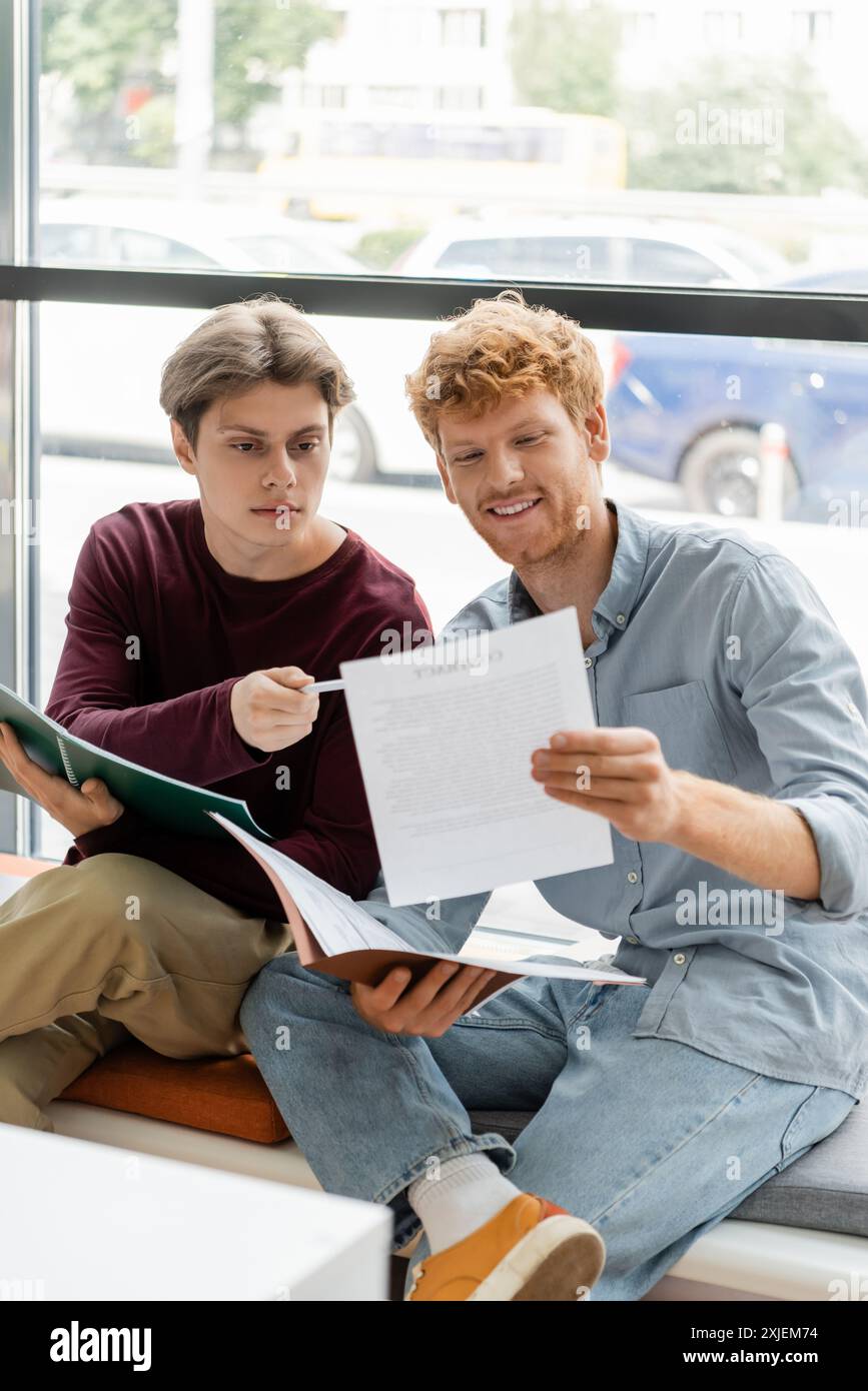 Two handsome men engage hi-res stock photography and images - Alamy