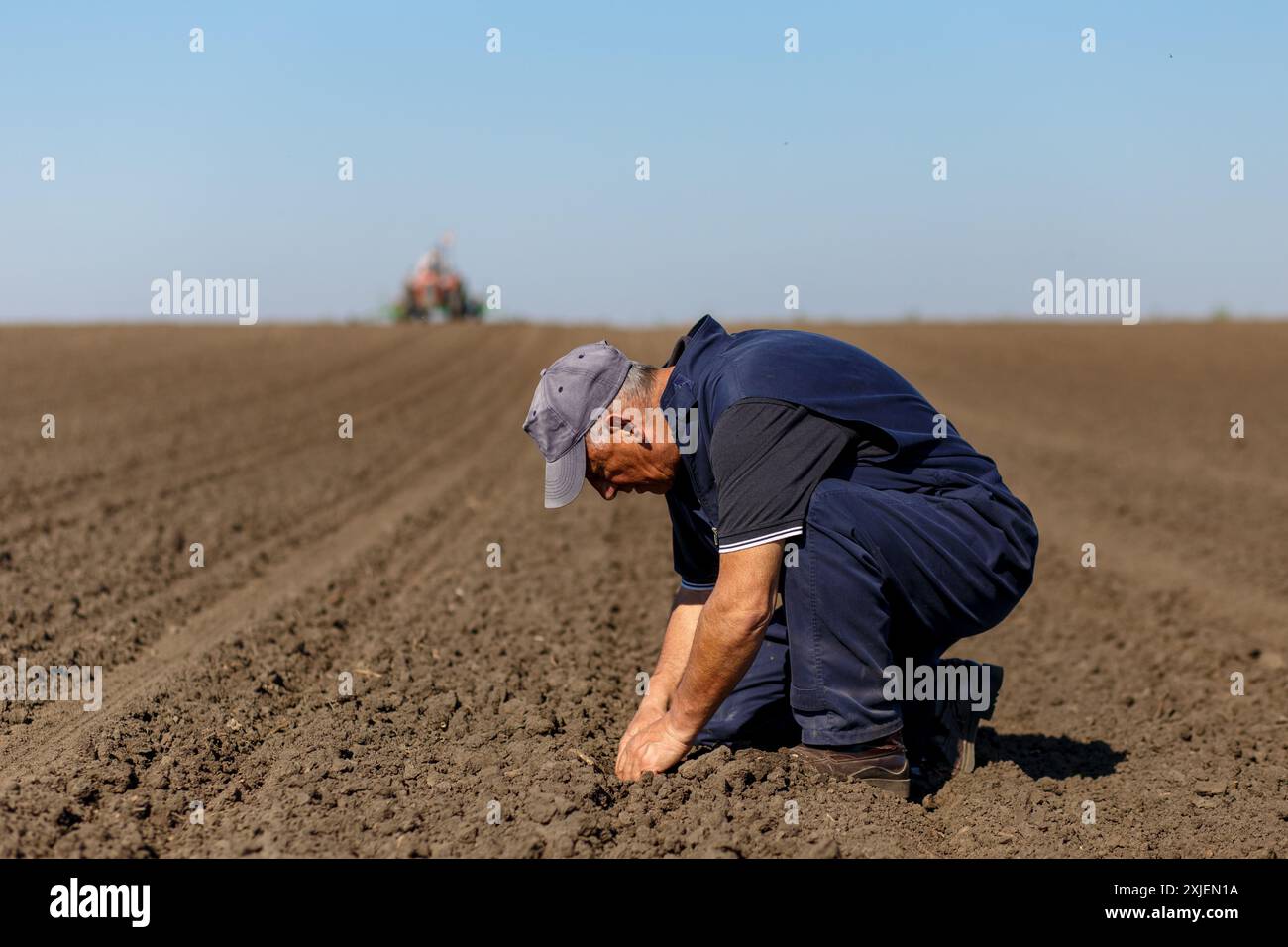 Farmer sowing seed hi-res stock photography and images - Alamy