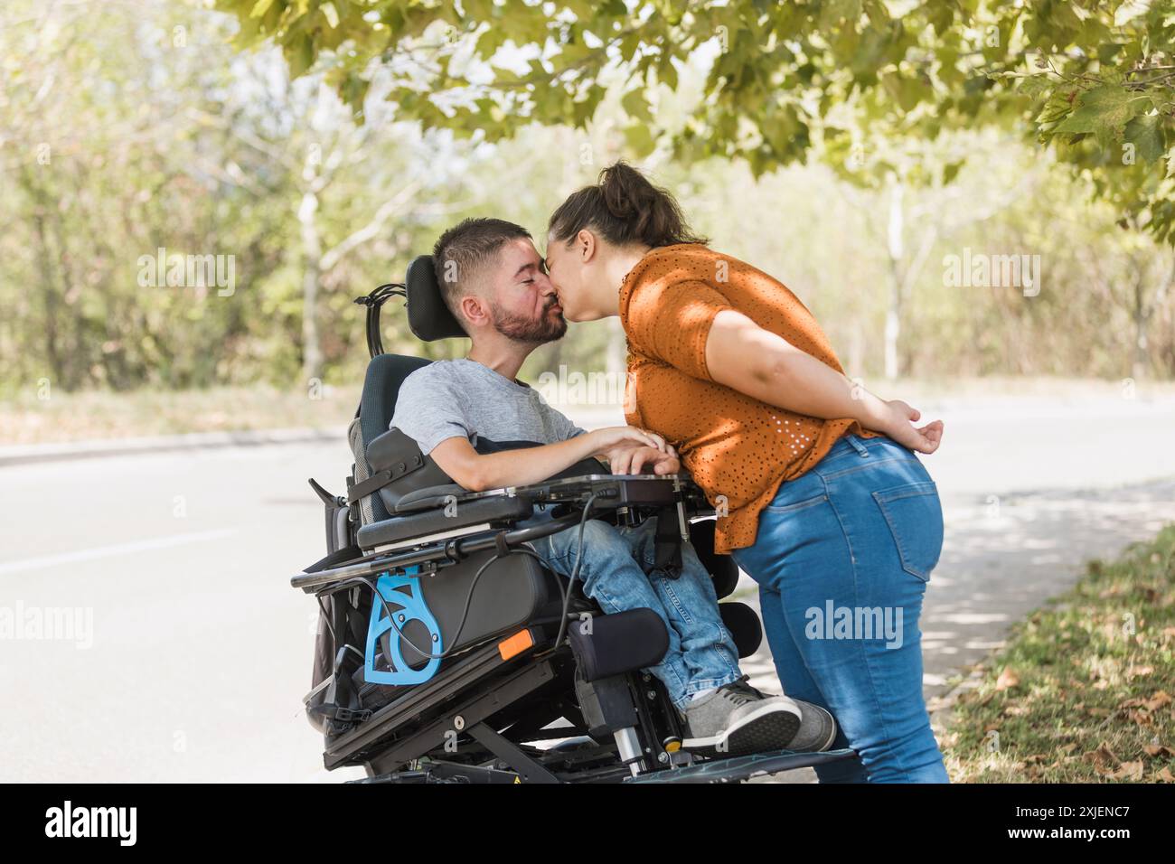 Gentle touch of married couple hands, of man with physical impairment ...