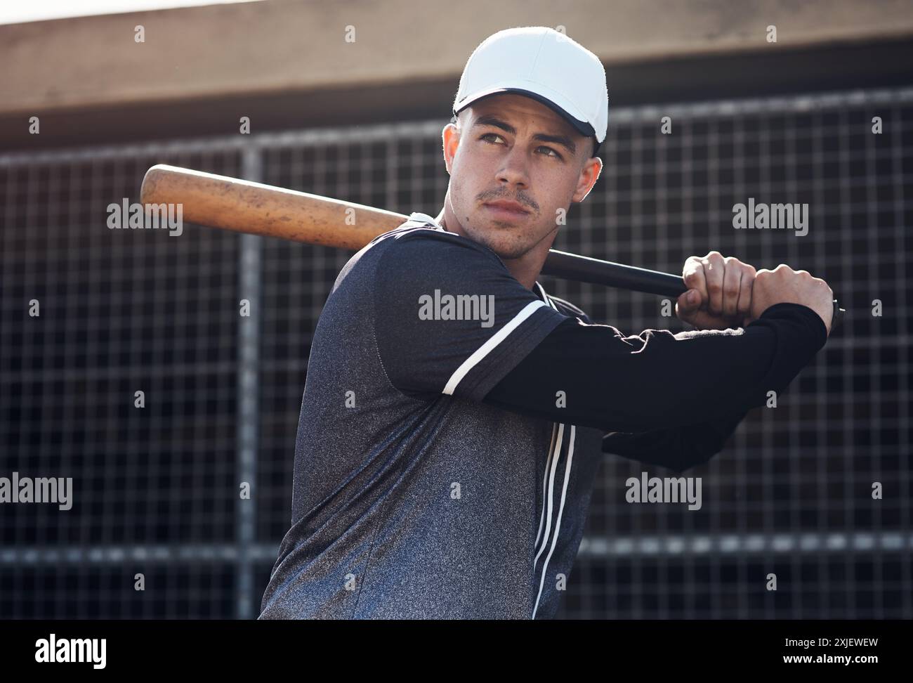 Baseball, batter and ready for game, man and professional in uniform of ...