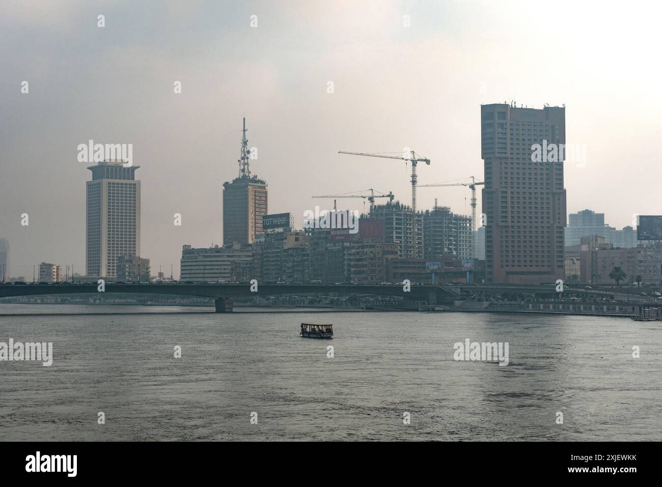Building and construction cranes of the Cairo city skyline seen through ...