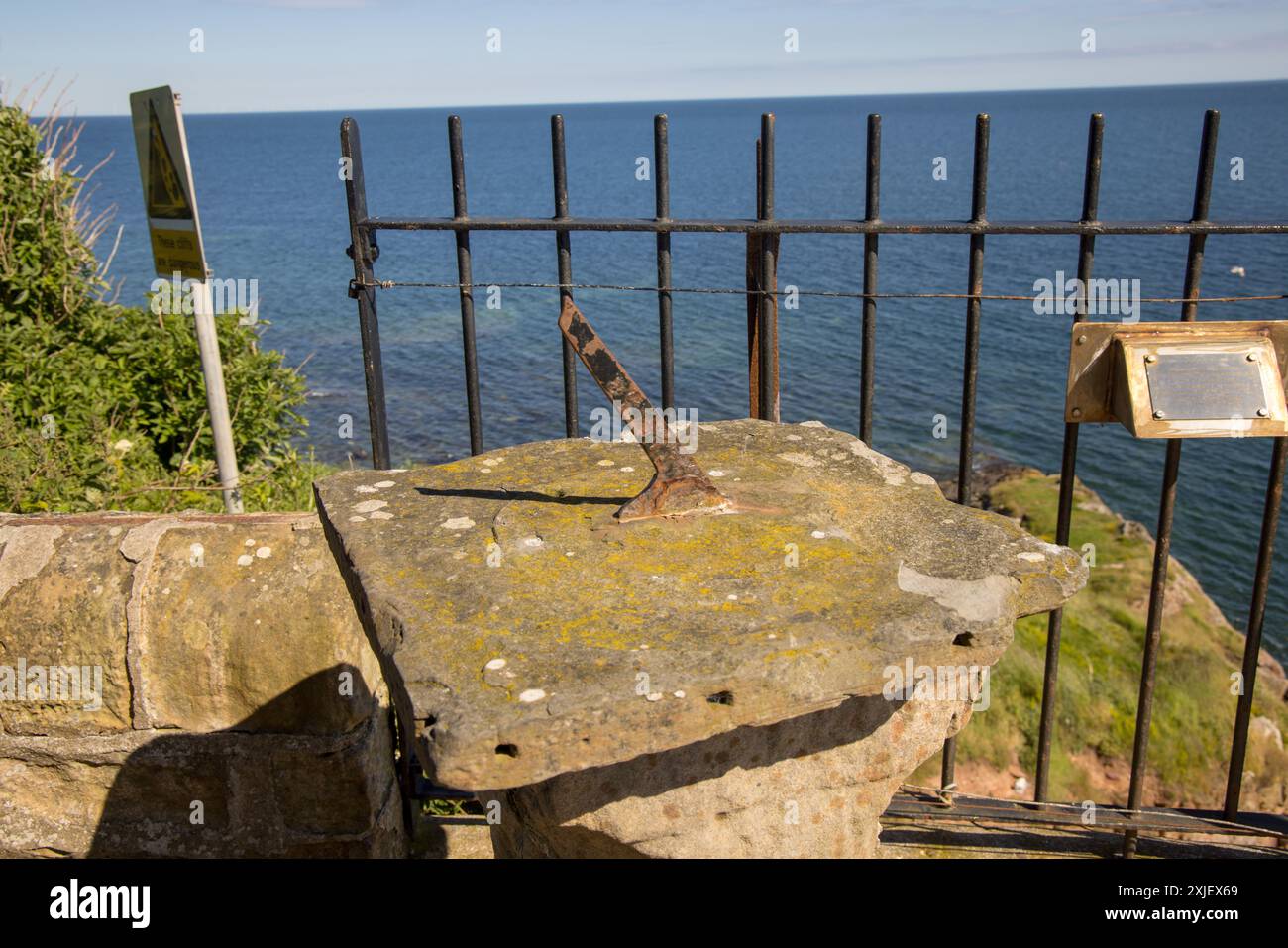 Historical sundial (17th century) on a pillar on the Castle Promenade ...