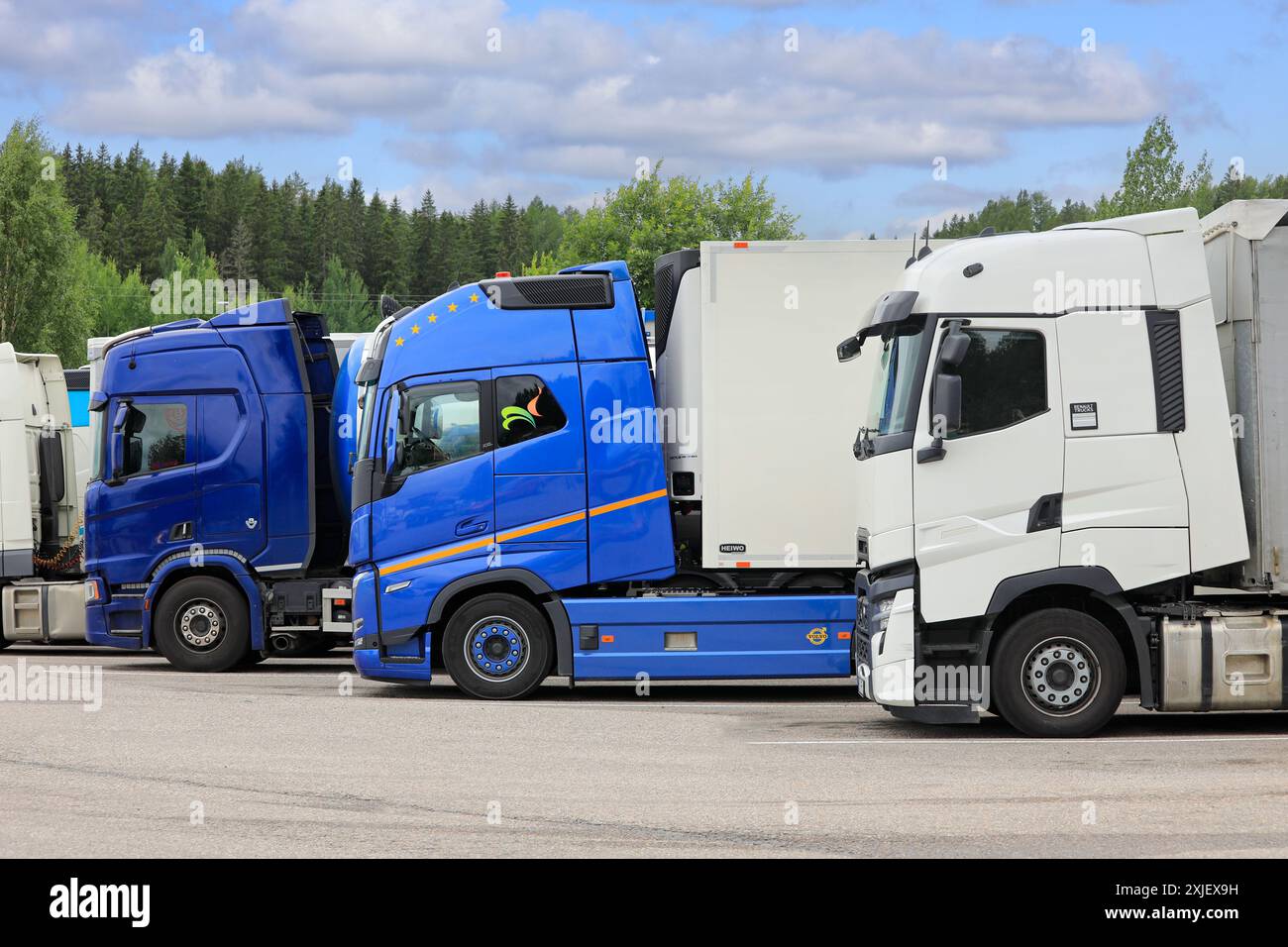 New Scania R580, Volvo FH and Renault heavy trucks parked on a truck ...