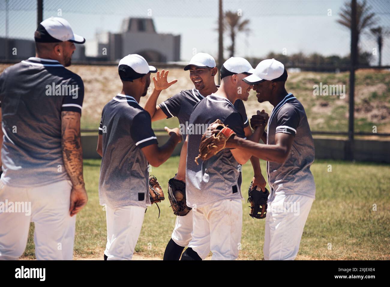Baseball player, men and team in celebration, winning and handshake for ...