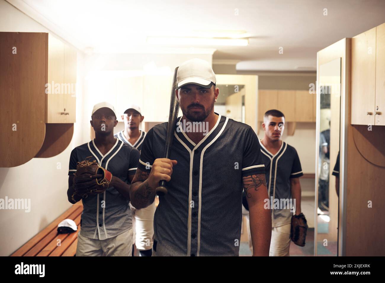Baseball, man and captain for team in locker room, tournament and walk ...