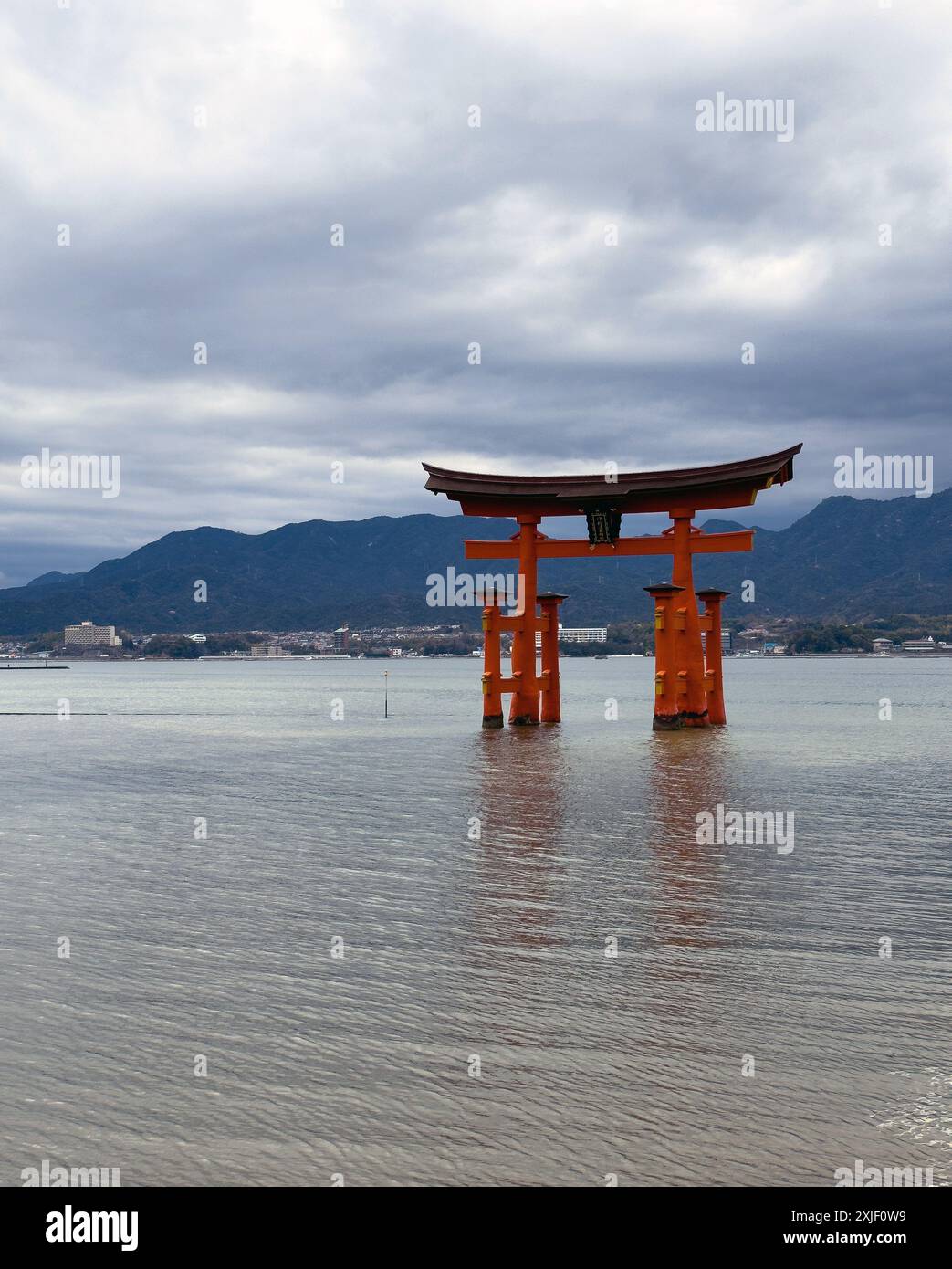 Japan, Itsukushima Shrine, Shinto floating torii orange red gate in the ...