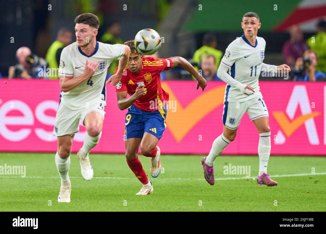 Phil Foden, England 11 Declan Rice, England 4 compete for the ball ...