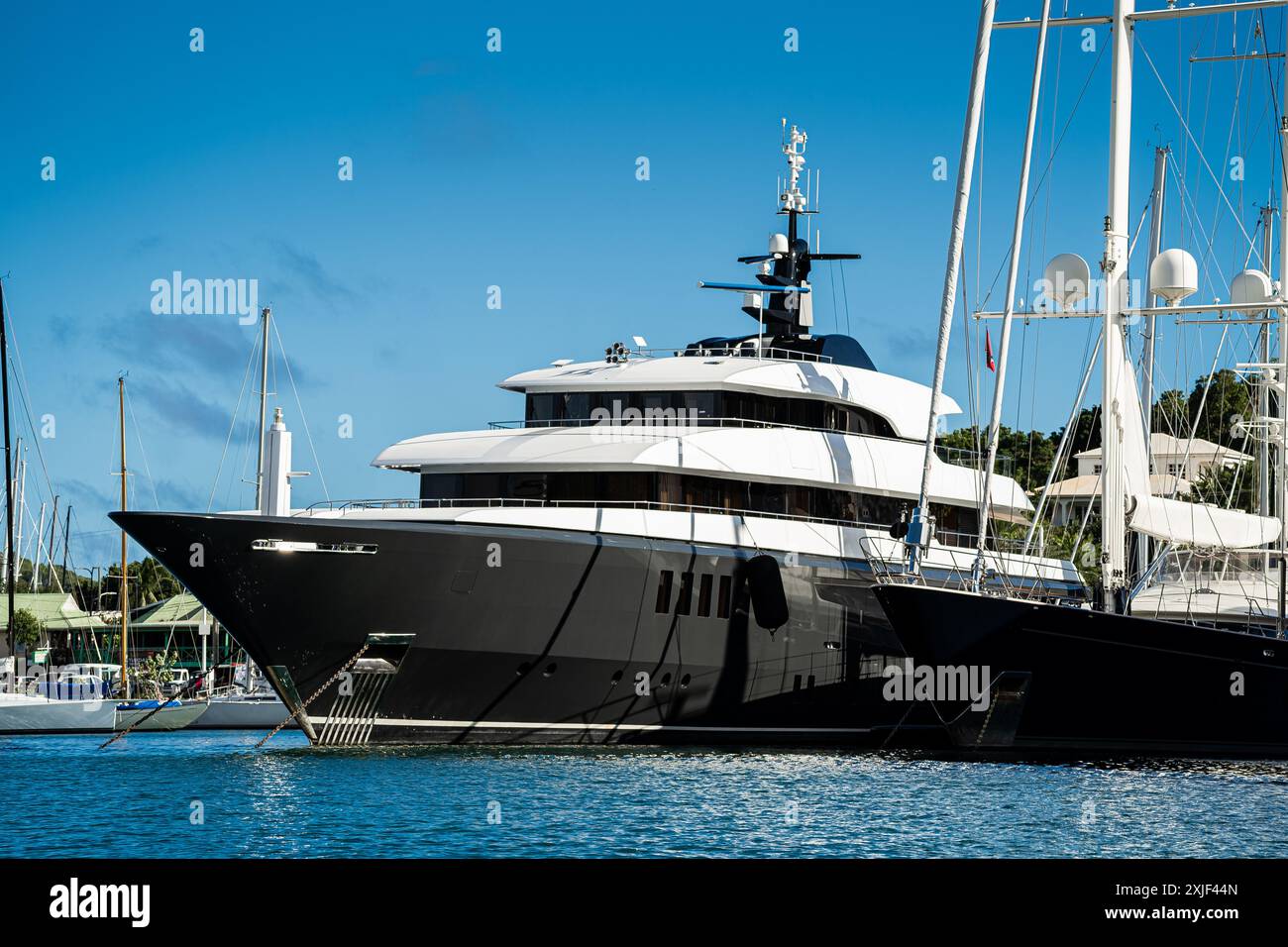 Beautiful mega and superyachts at dock in English Harbour, a famous ...