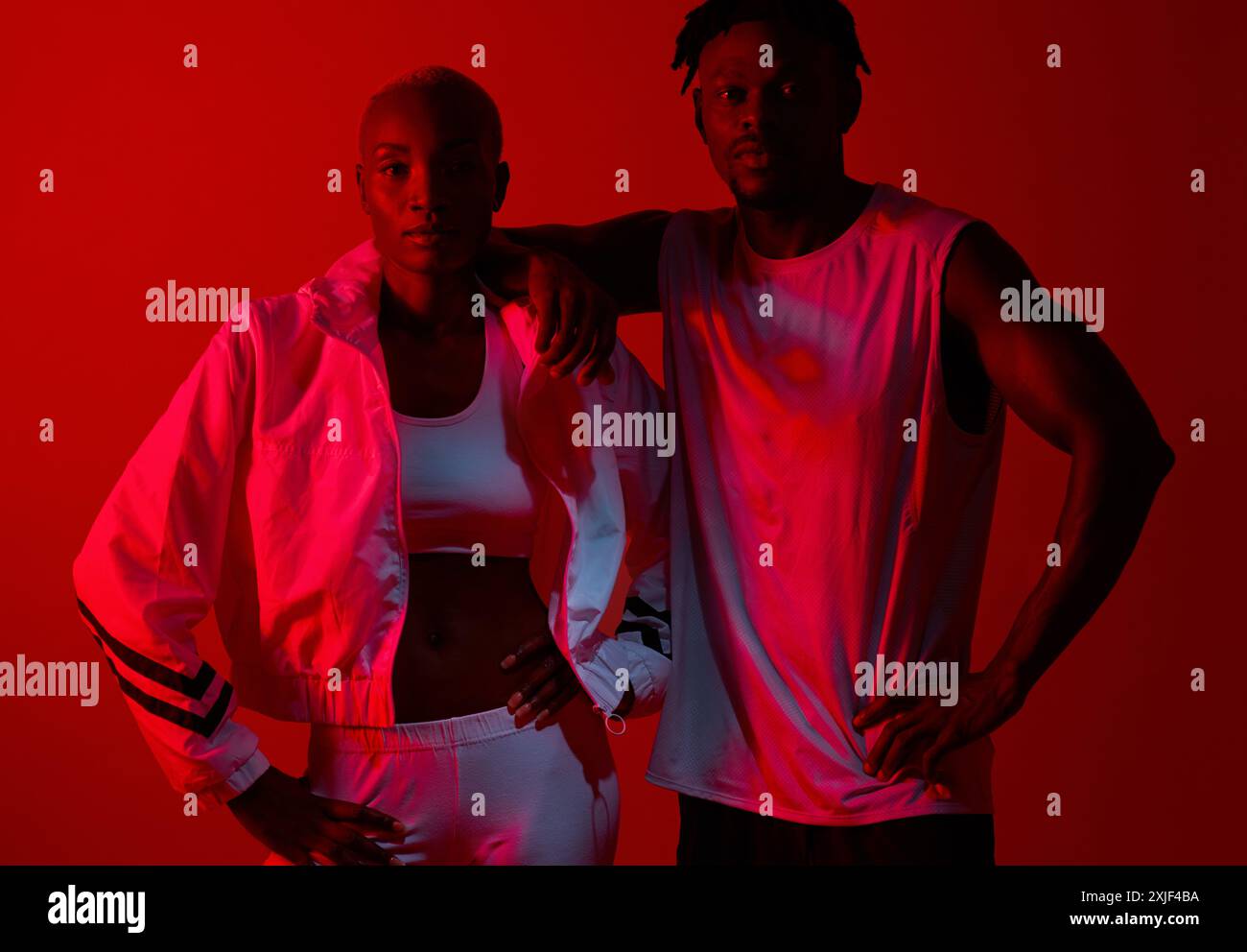 Black woman in red tracksuit hi-res stock photography and images - Alamy