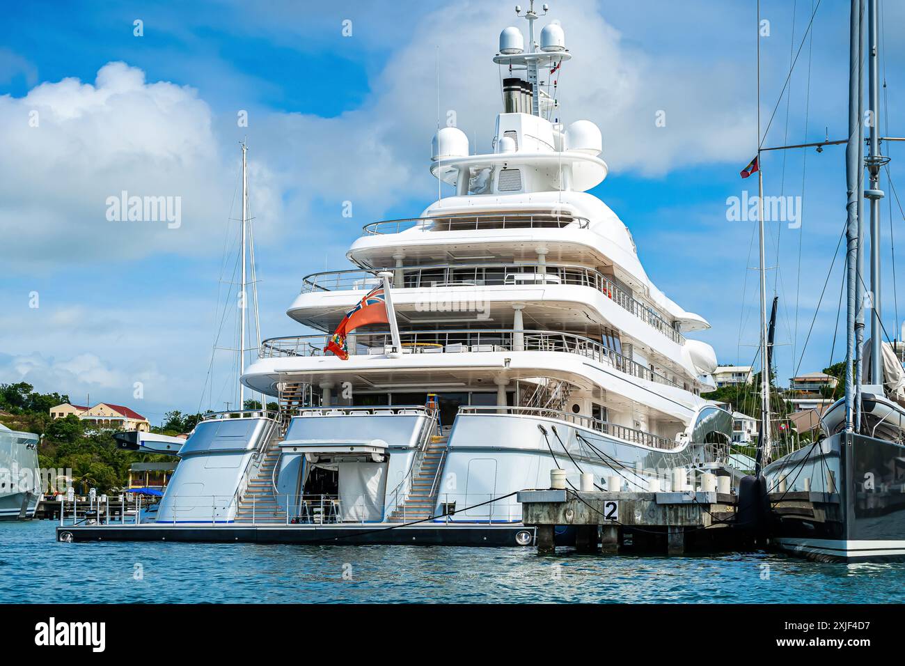 Several beautiful and spotless mega and superyachts at dock in English ...