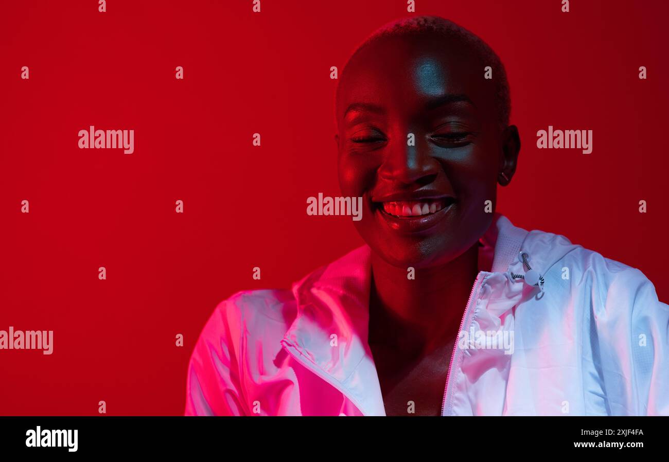 Smile, black woman and fitness with neon red for sports, exercise and ...