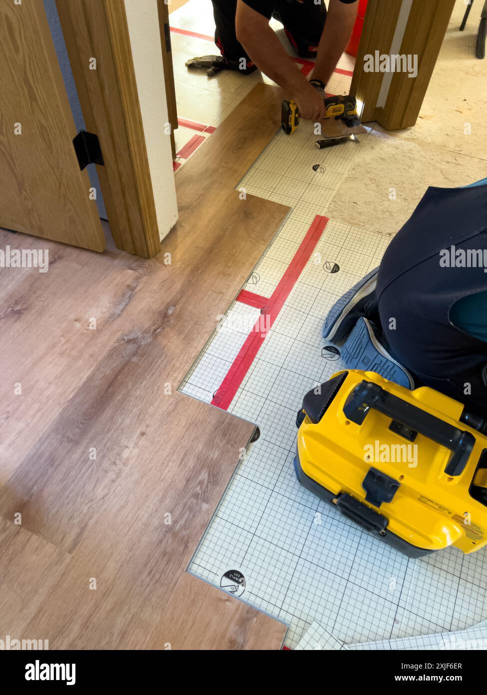 Flooring Installation Process with Underlayment Stock Photo - Alamy