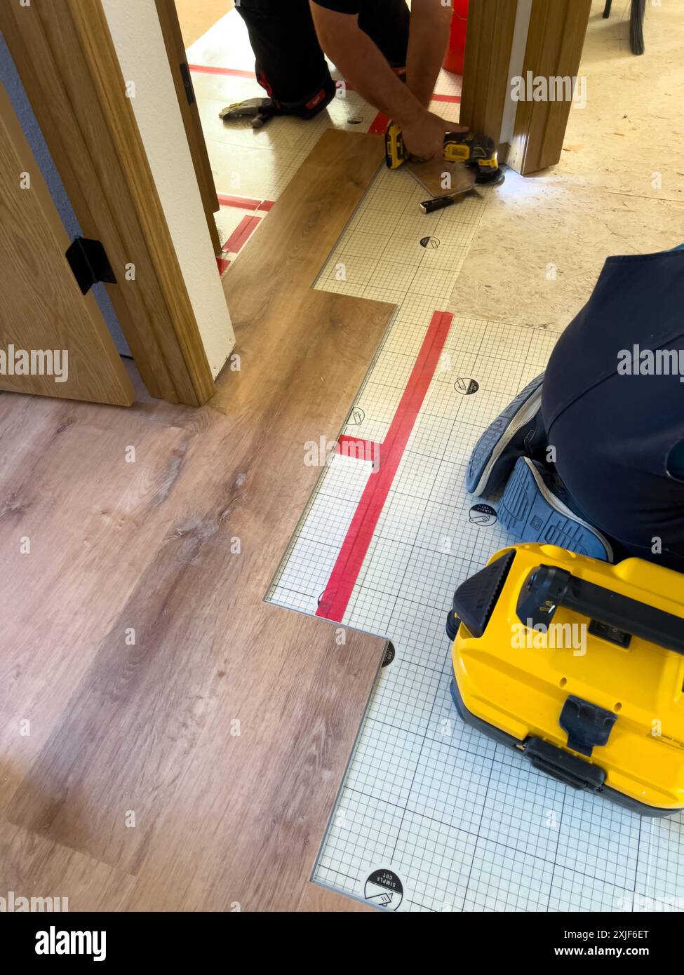 Flooring Installation Process with Underlayment Stock Photo - Alamy