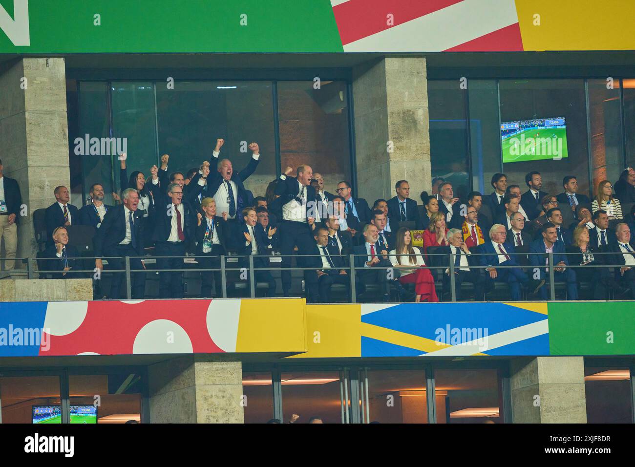 First two rows (L-R) at 1-1 goal: Bernd Neuendorf, David Gill, Lisa ...