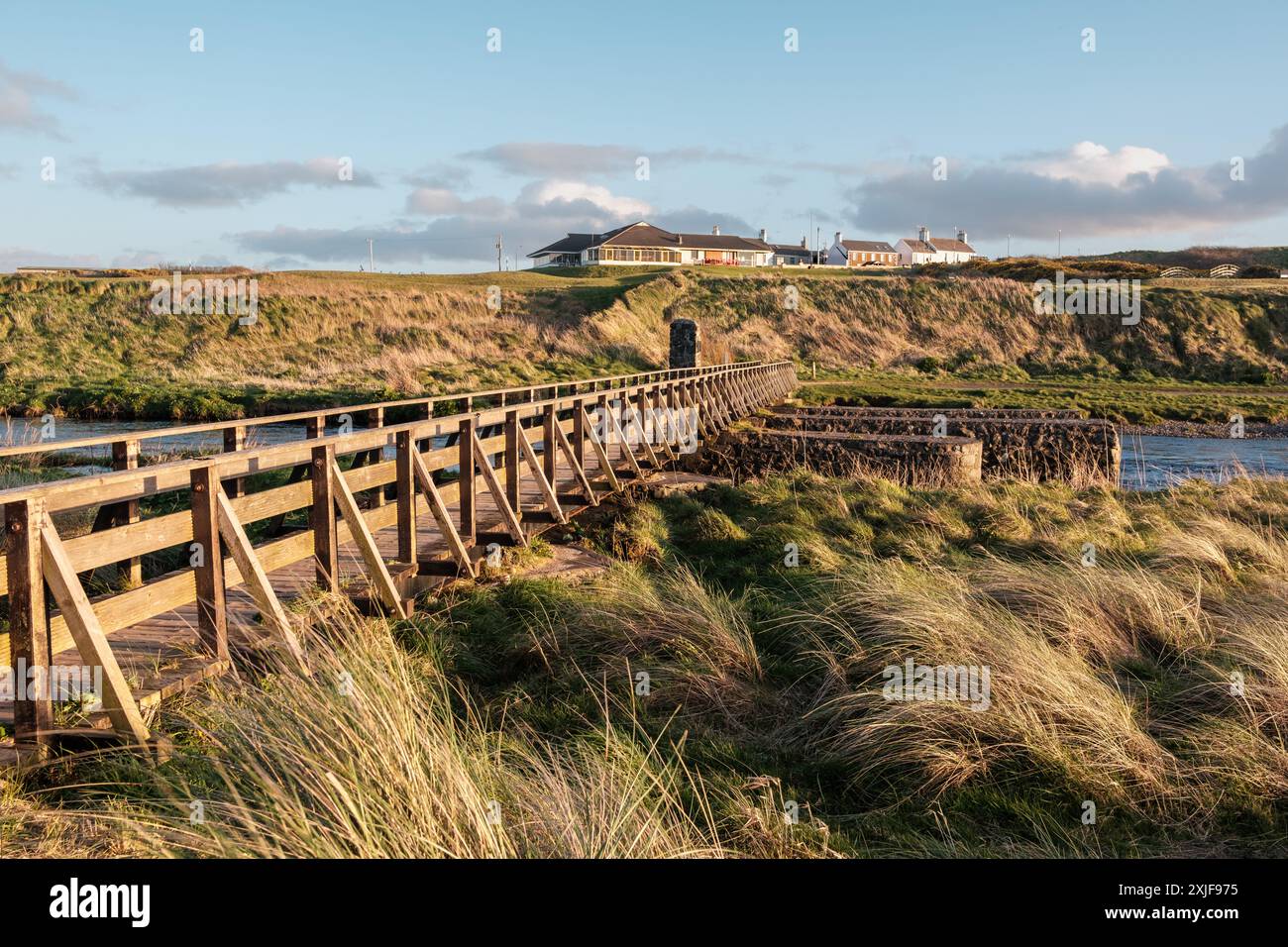 Coastal Path footbridge on Bushfoot Golf Course near Portballintrae in ...