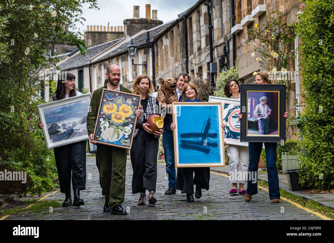 Staff of New Town art galleries with artwork paintings and sculptures o ...