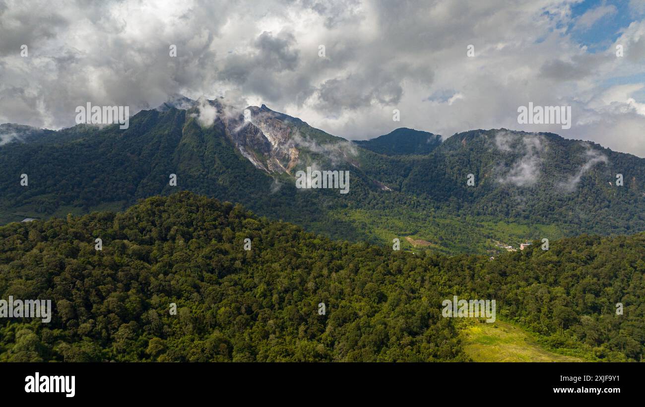 Active Sibayak volcano and mountains with forest. Sumatra, Indonesia ...