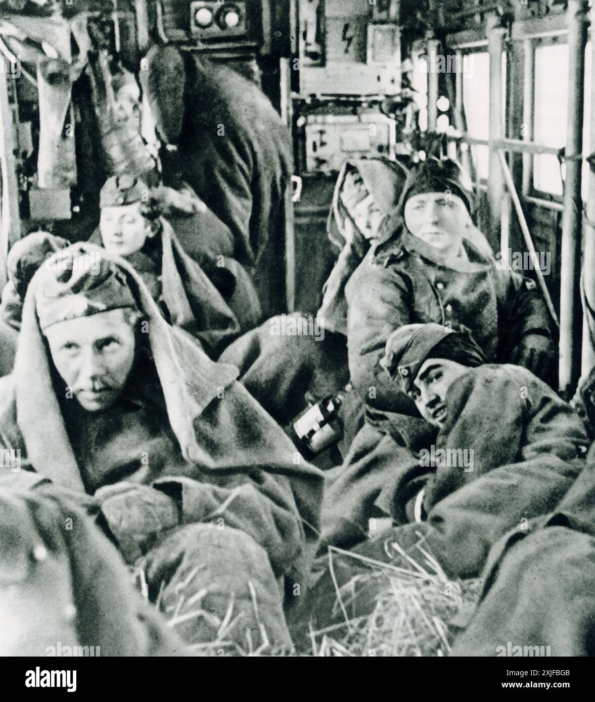 A photograph shows wounded soldiers inside a Junkers Ju 52 during ...