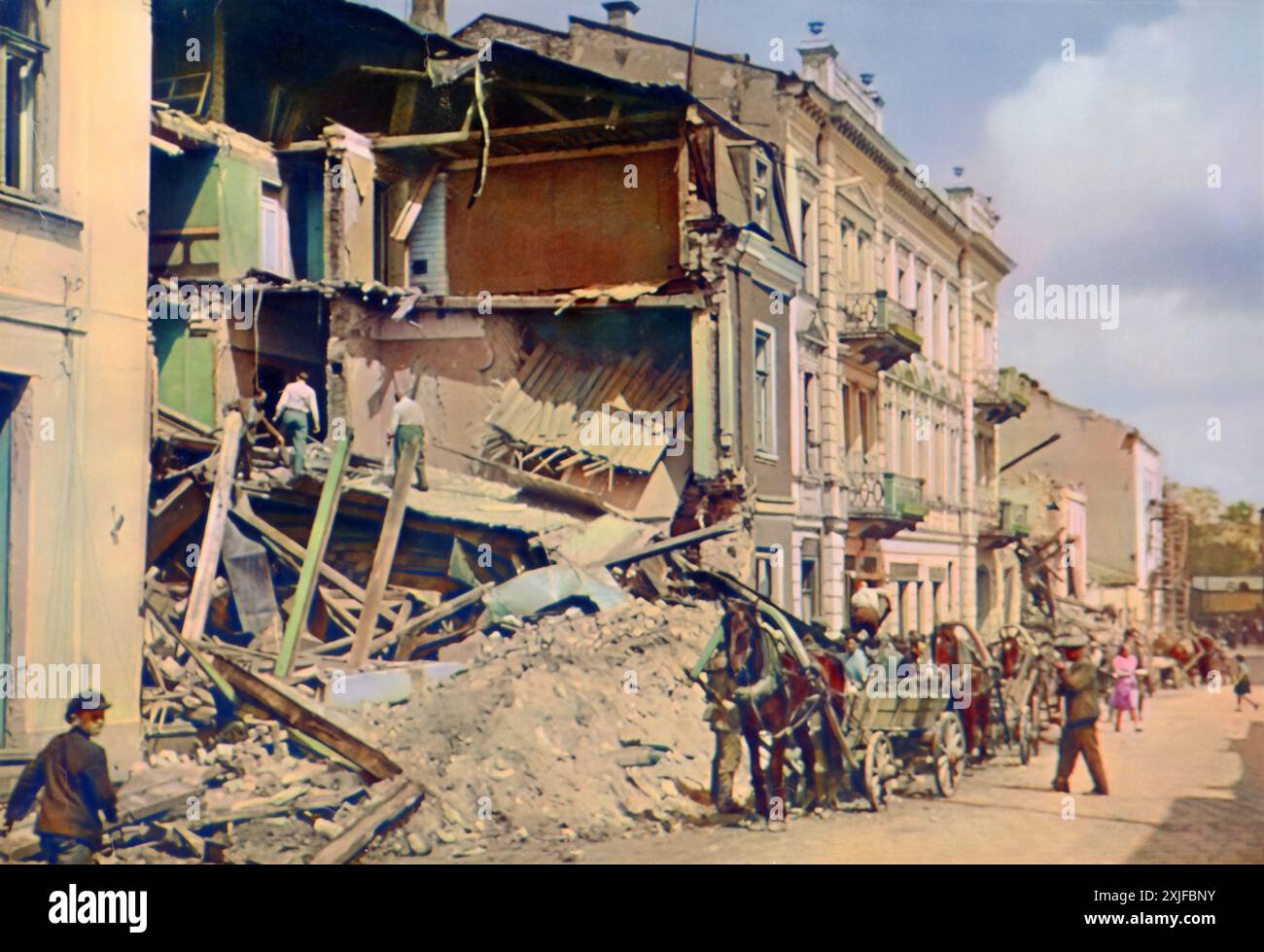 A photograph shows immediate cleanup operations beginning following the ...