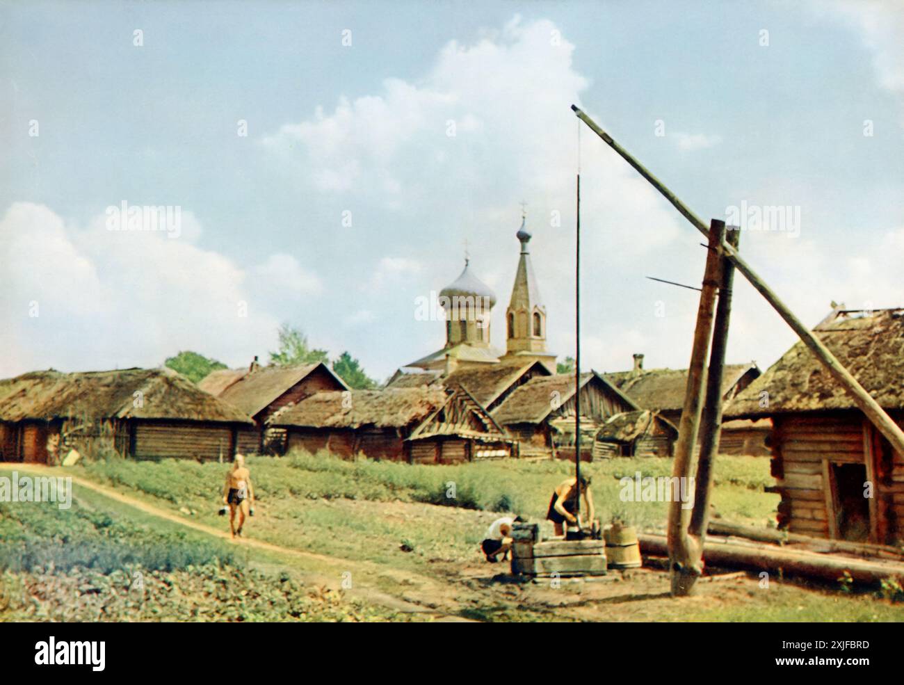 A colour photograph of a typical Russian farming village, taken during ...