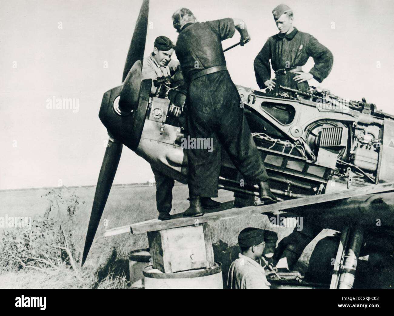 A photograph shows Spanish volunteers in the German army performing ...