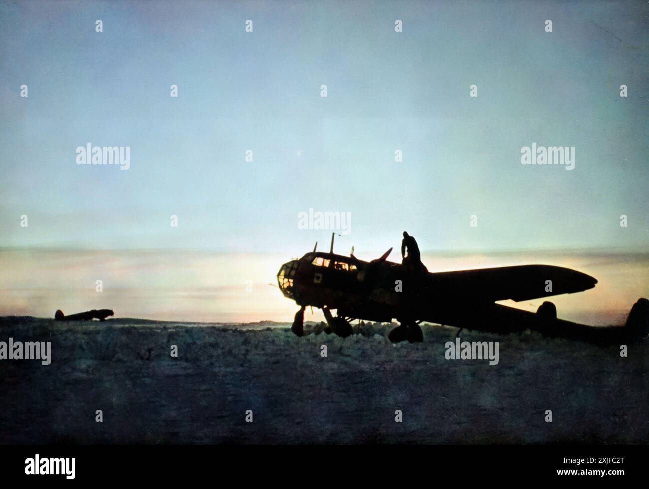 A photograph shows a Dornier Do 17 Z bomber being readied for takeoff ...