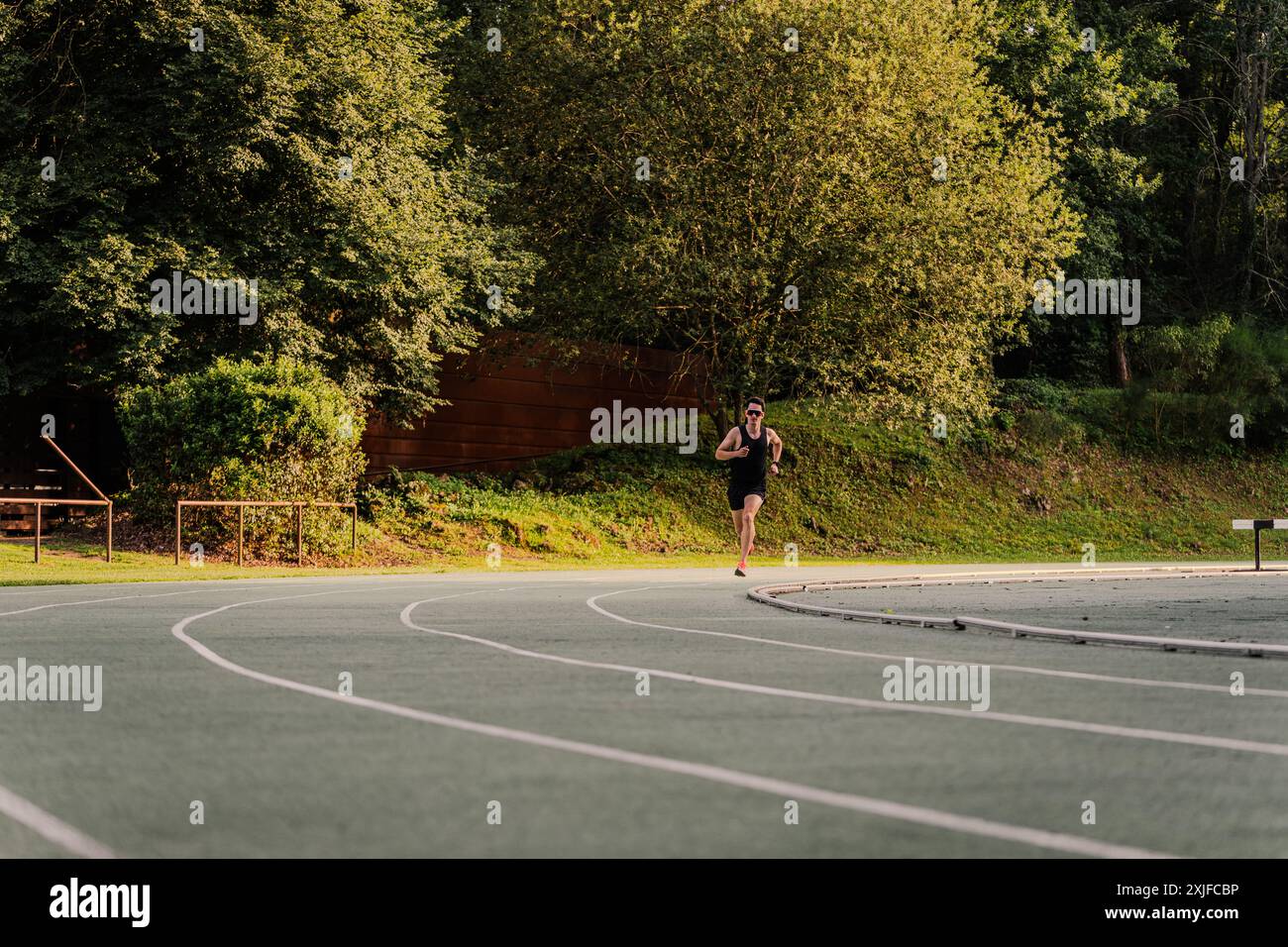 Expert runner using the inside lane of the track during the 400m sprint ...