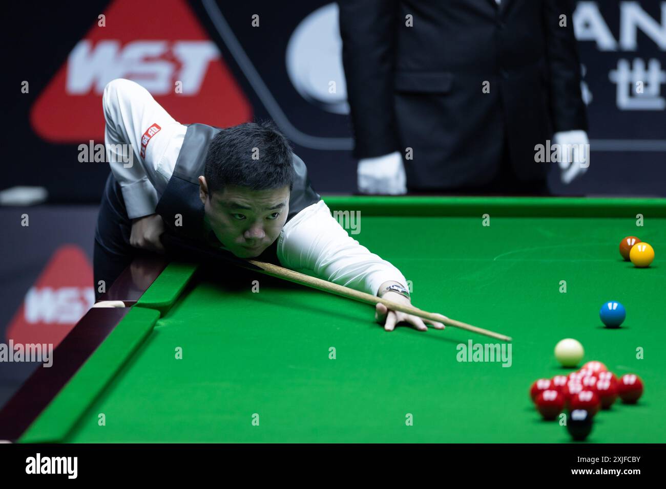 SHANGHAI, July 18, 2024 -- Ding Junhui of China competes during the ...