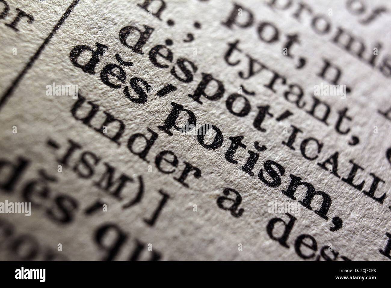 Word despotism on dictionary page, macro close-up Stock Photo - Alamy