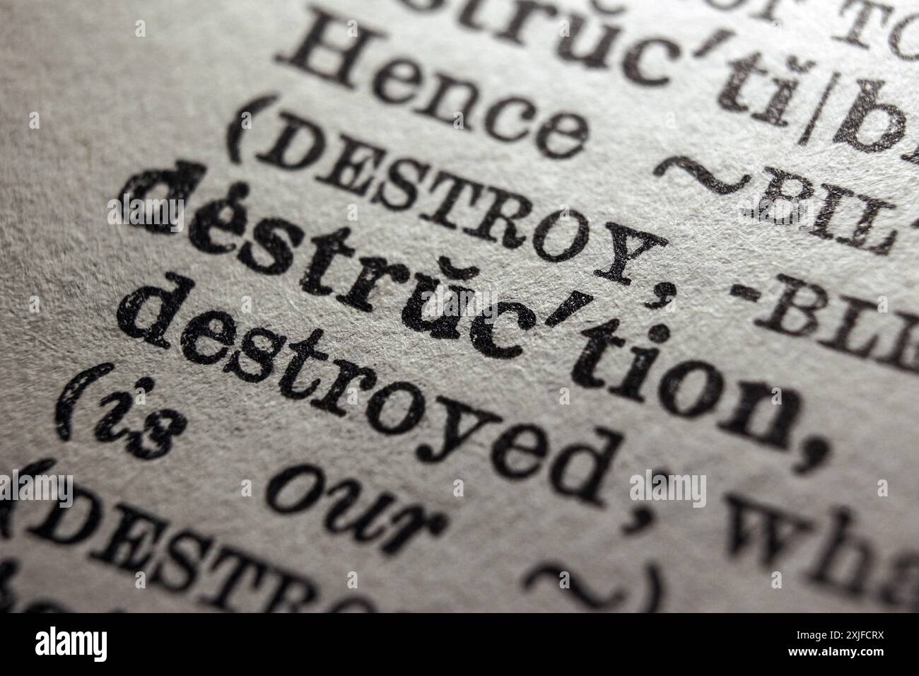 Word destruction on dictionary page, macro close-up Stock Photo - Alamy