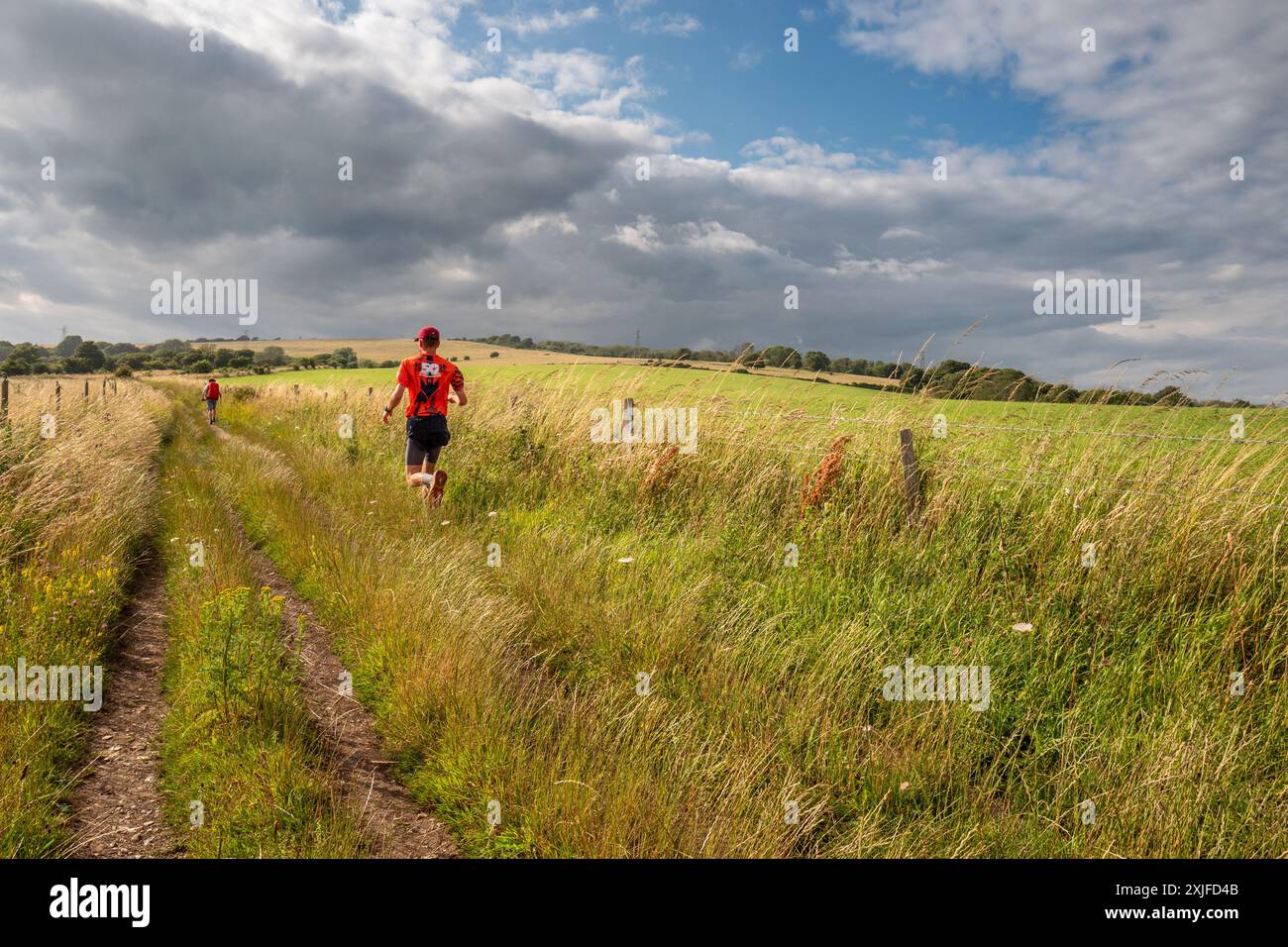 Lewes, July 16th 2024: A runner at Black Cap on the South Downs Stock ...