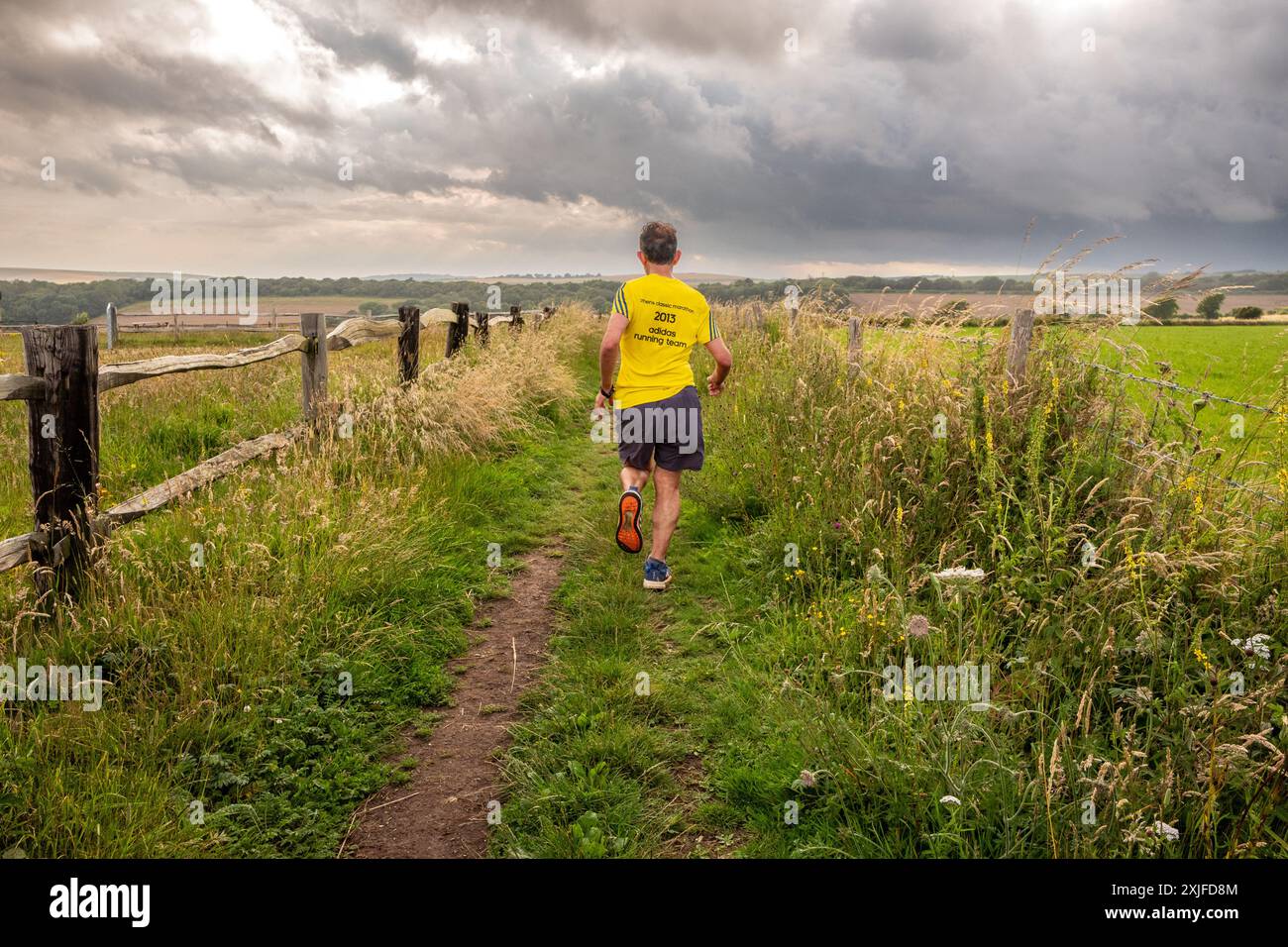 Lewes, July 16th 2024: A runner at Black Cap on the South Downs Stock ...