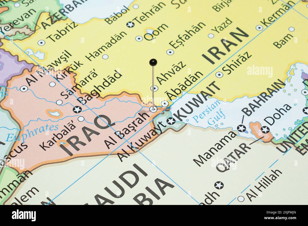 Close up to a Basra city with a black pin needle into Iraq country ...