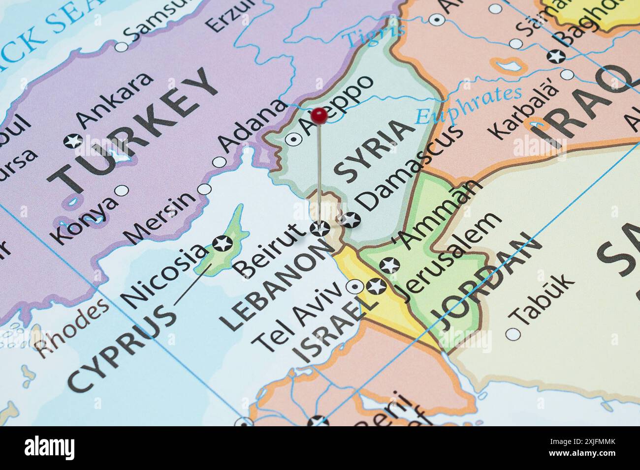 Close up to a Beirut city with a red pin needle into Lebanon country ...