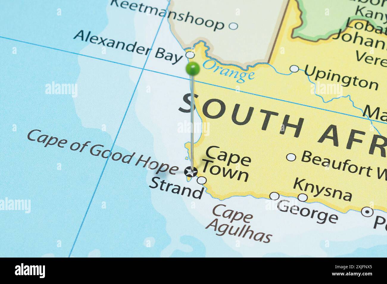 Macro photography of Cape Town city with a green pin needle into South ...