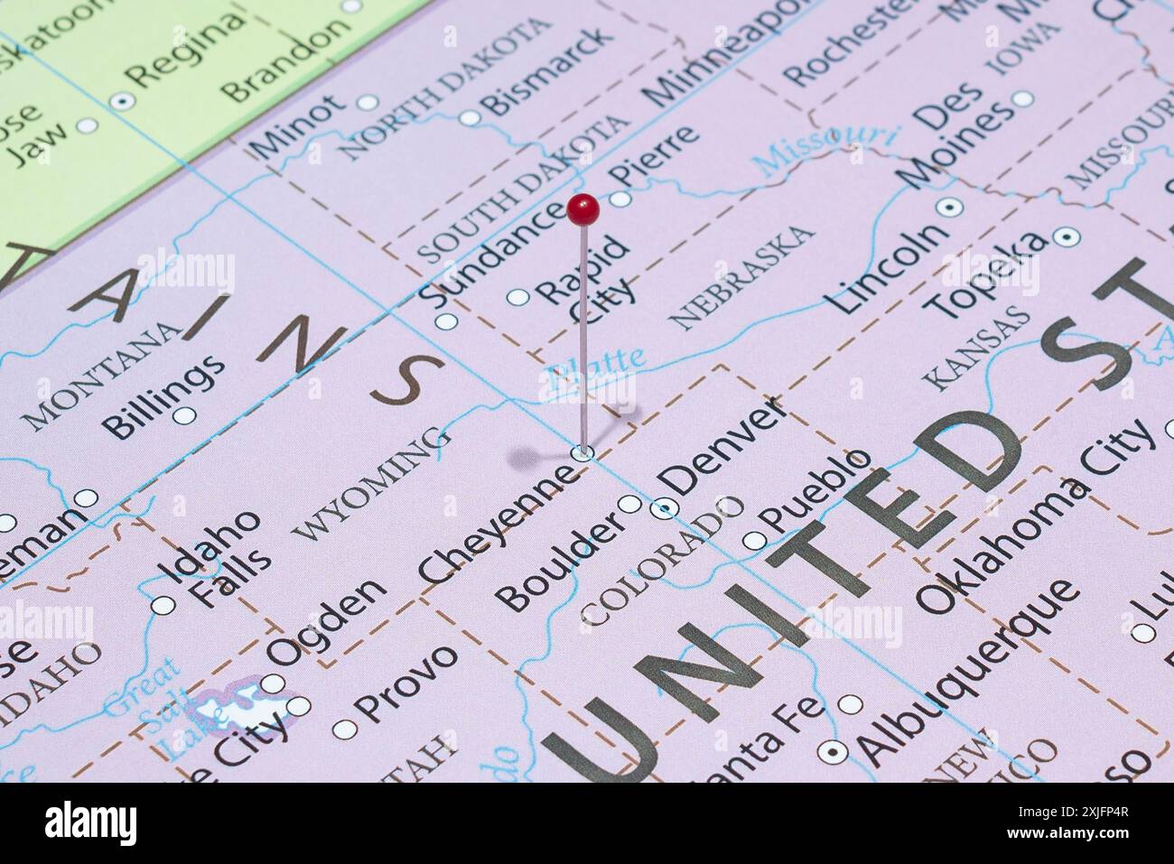 Close up to a Cheyenne city with a red pin needle into United States of ...