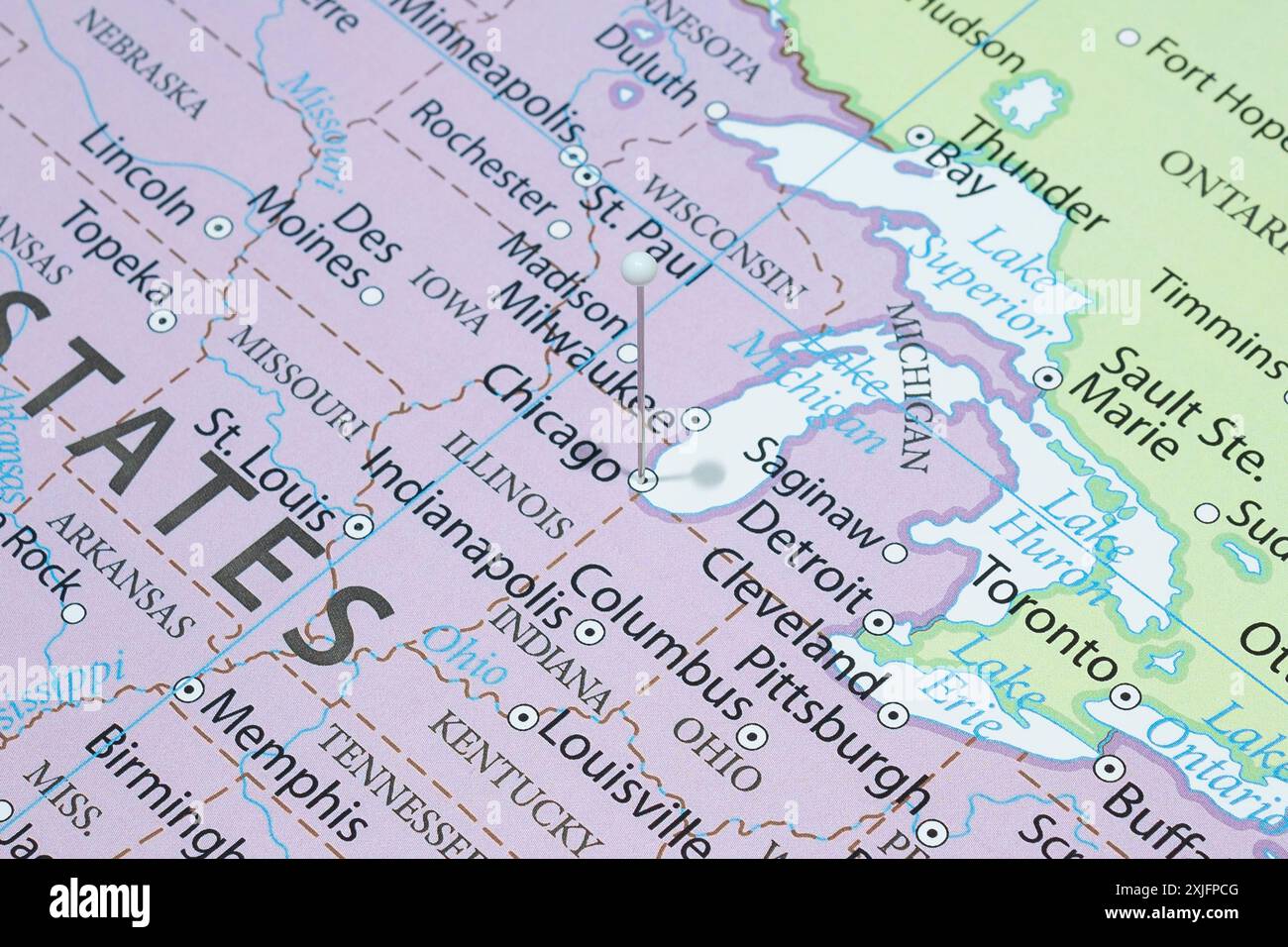 Close up to a Chicago city with a white pin needle into United States ...