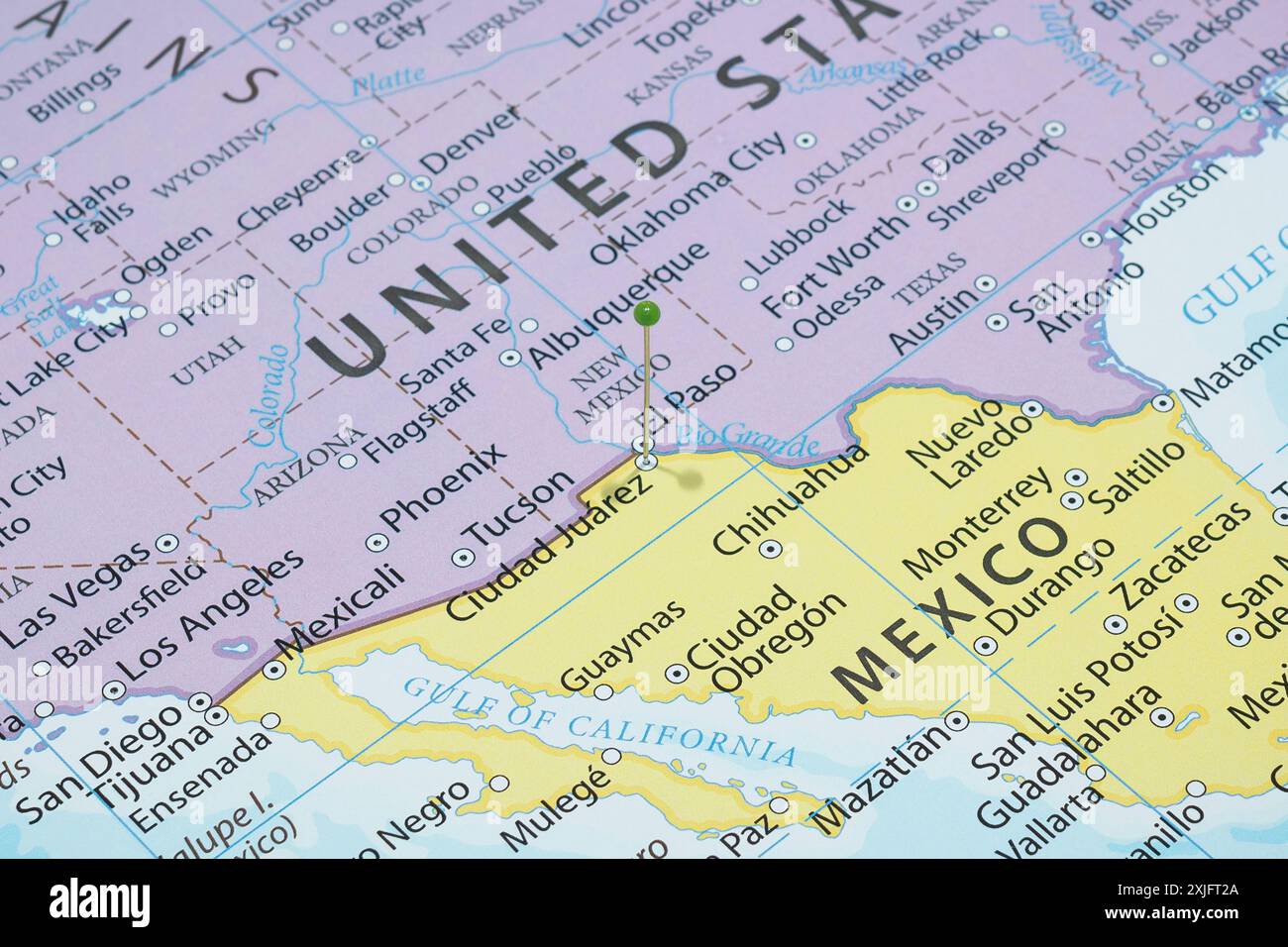 Close up to a Ciudad Juarez city with a green pin needle into Mexico ...