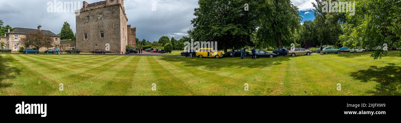 Panorama of vintage cars parked around lawn at a car rally, Lennoxlove ...