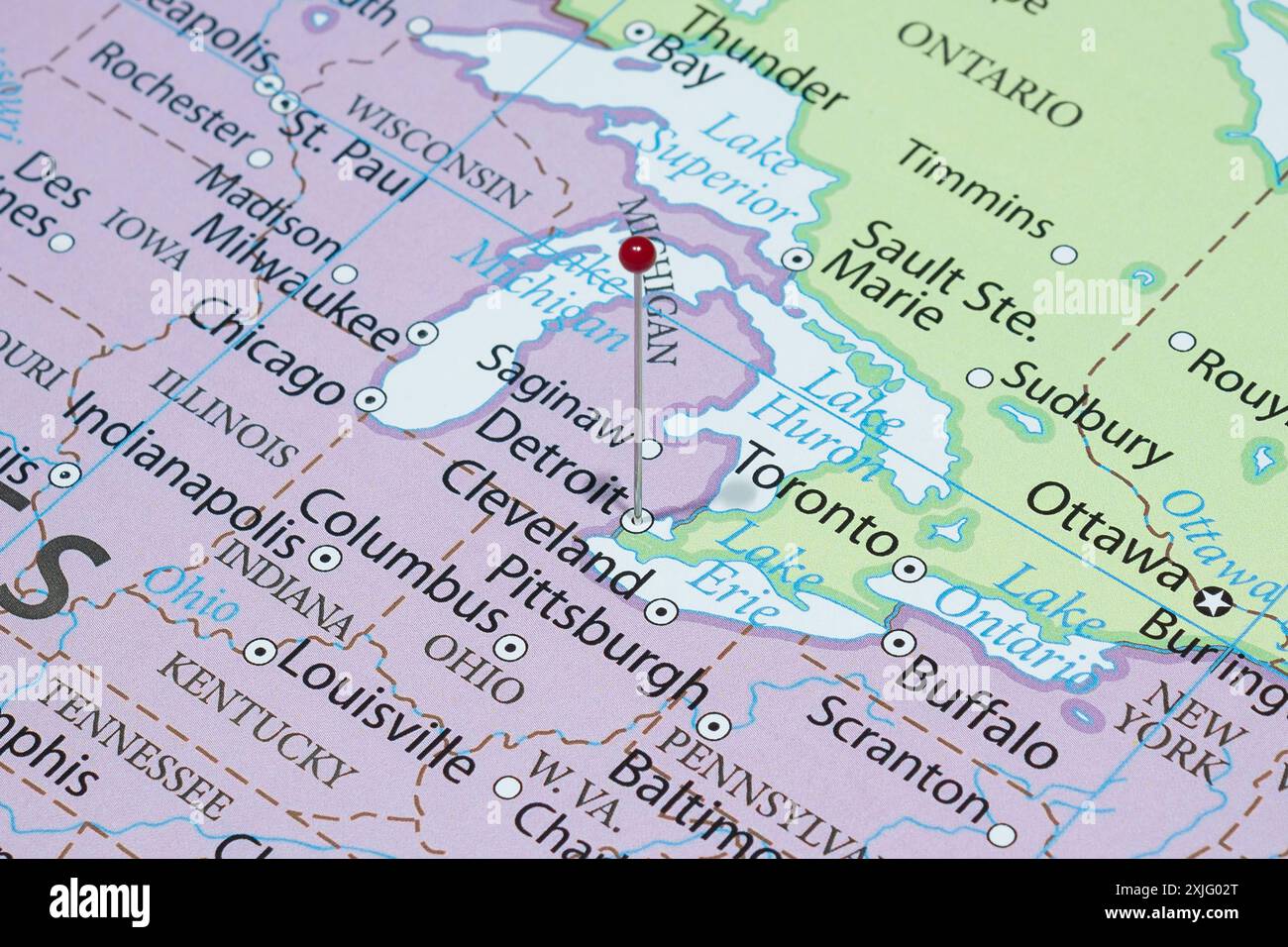 Close up to a Detroit city with a red pin needle into United States of ...