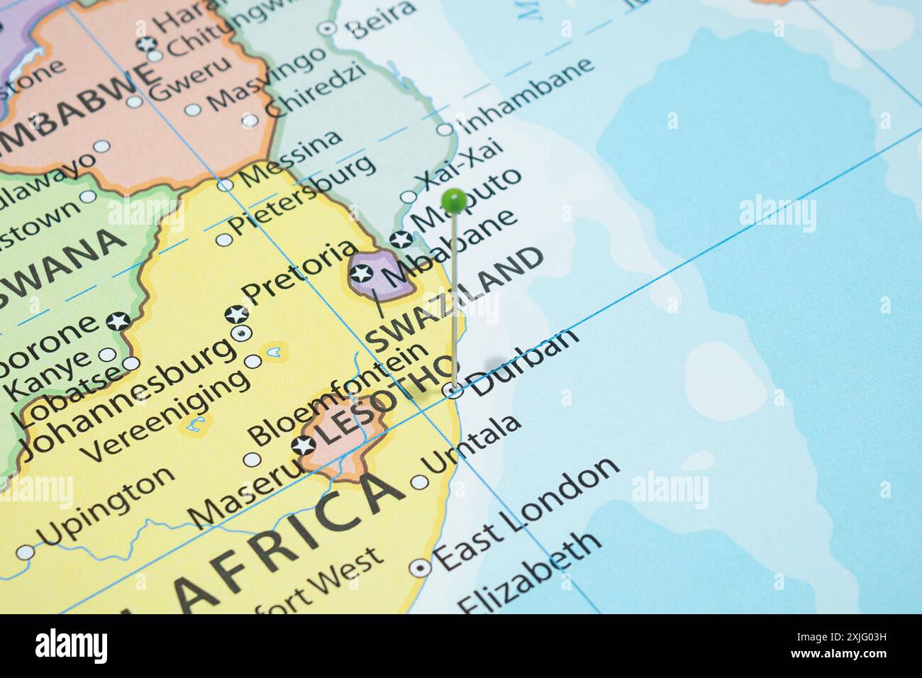 Close up to a Durban city with a green pin needle into South Africa ...