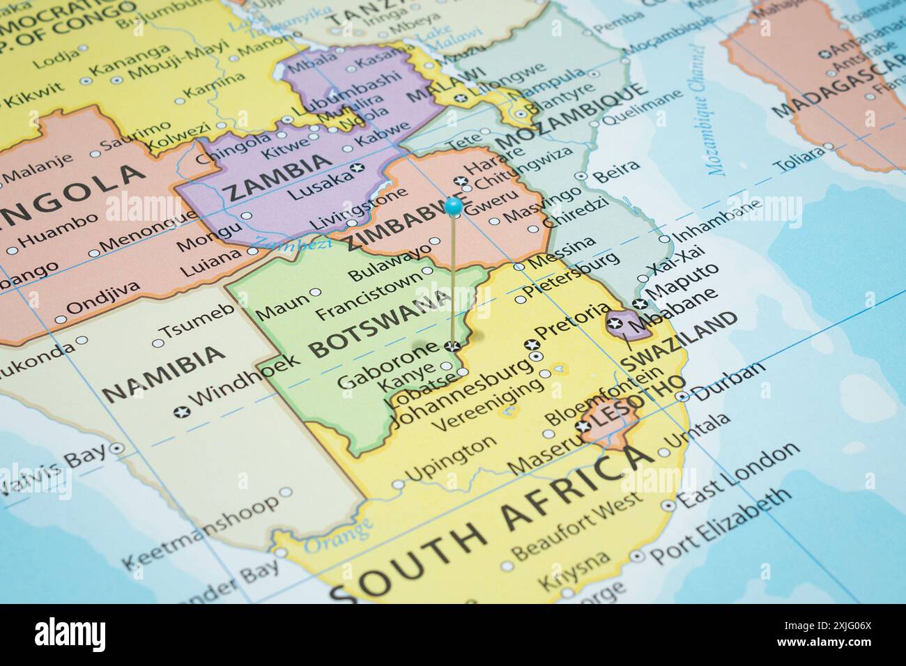 Close up to a Gaborone city with a light blue pin needle into Botswana ...