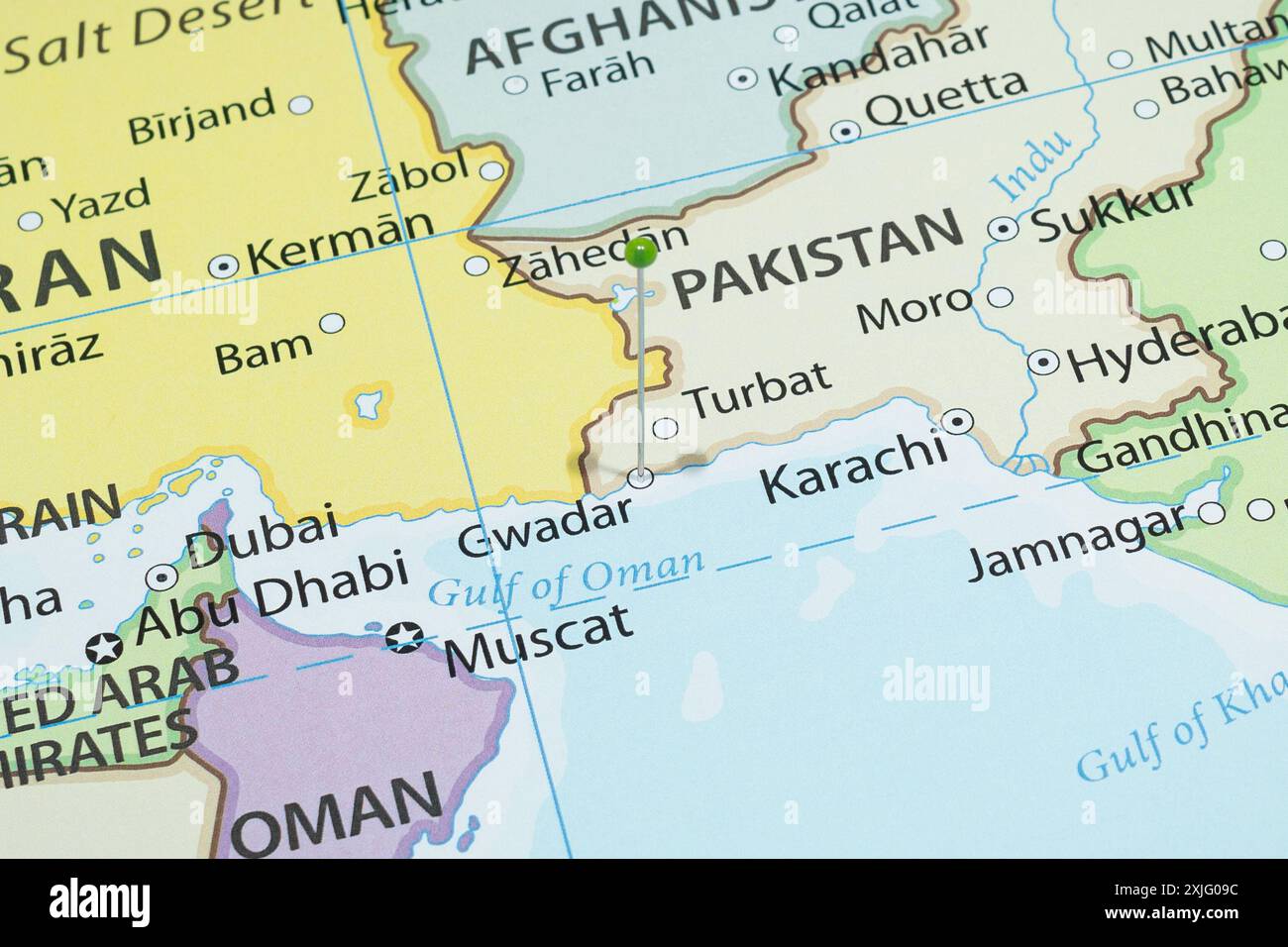 Close up to a Gwadar city with a green pin needle into Pakistan country ...
